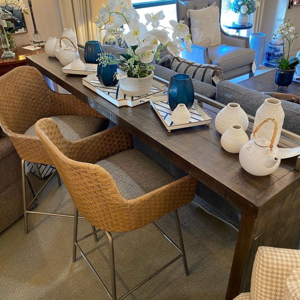 New to our showroom! We love our new console/bar made of sable wood and ...