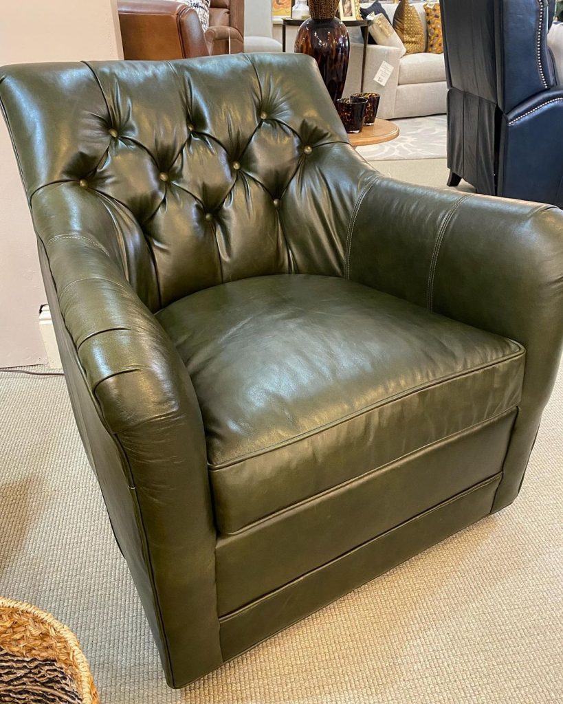 We love our new dark green leather, tufted swivel chair! A beautiful ...